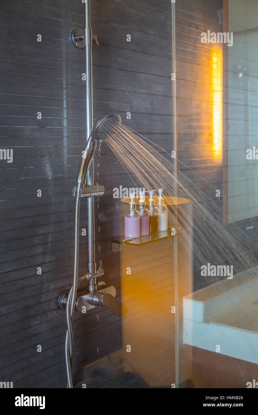 Shower while running water Stock Photo - Alamy