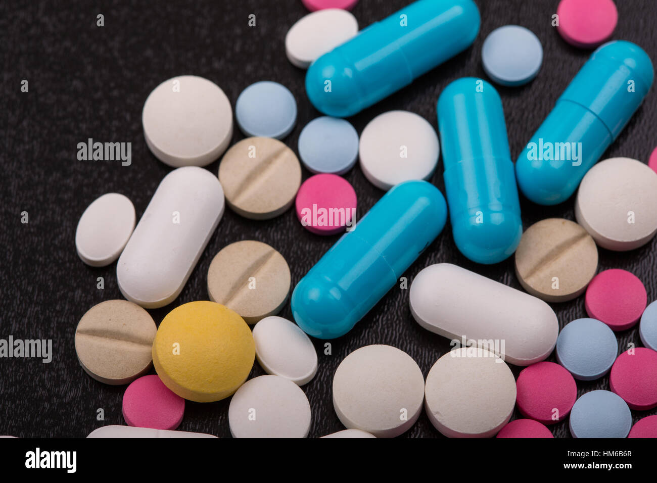 different tablets pills capsule heap mix therapy drugs Stock Photo - Alamy