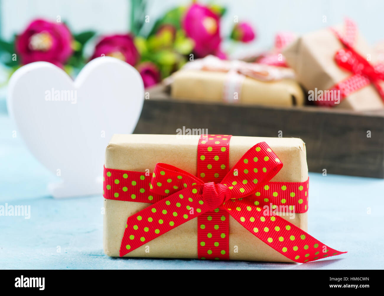 boxes for present on a table, holiday background Stock Photo - Alamy