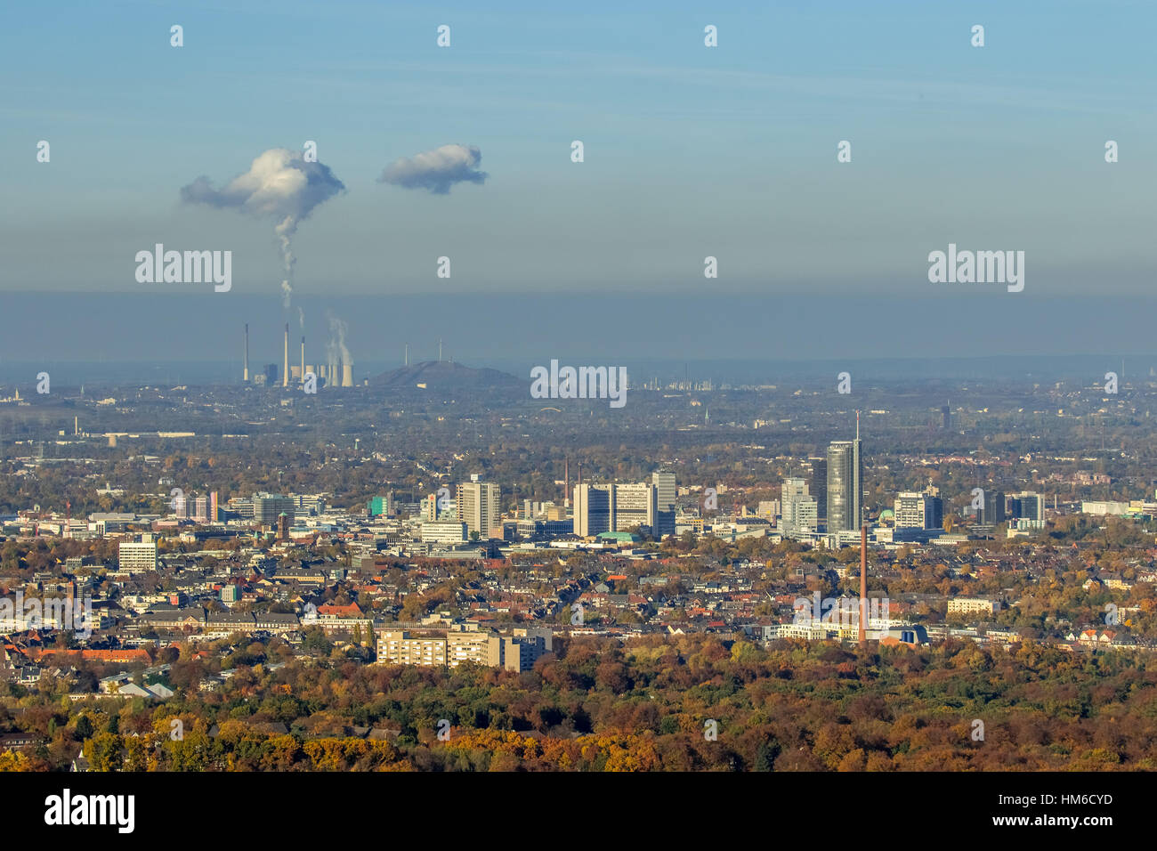 Cityscape with skyscrapers, power company Innogy with smoking chimneys ...