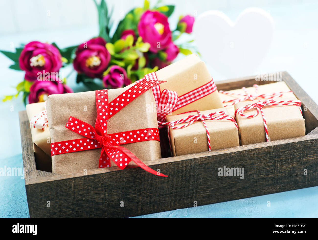 boxes for present on a table, holiday background Stock Photo - Alamy