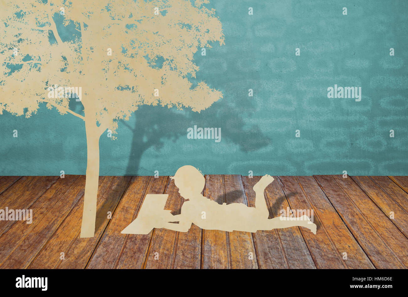 Children reading books under tree hi-res stock photography and images ...