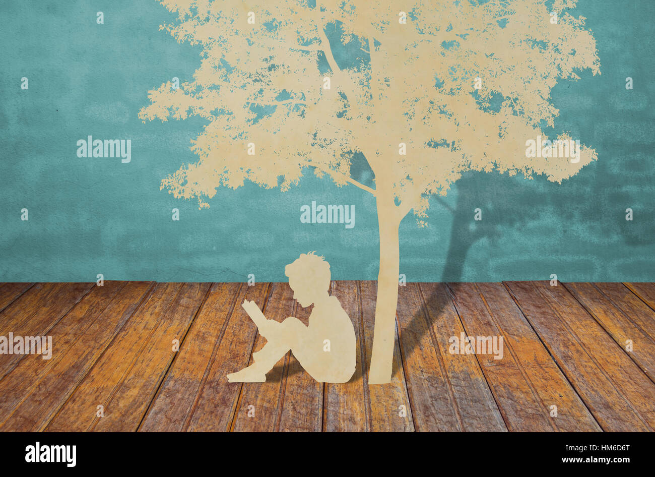 Children reading books under tree hi-res stock photography and images ...