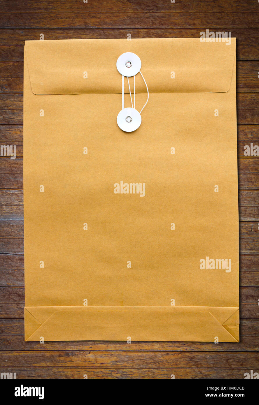 Paper Envelope on wood wall Stock Photo - Alamy