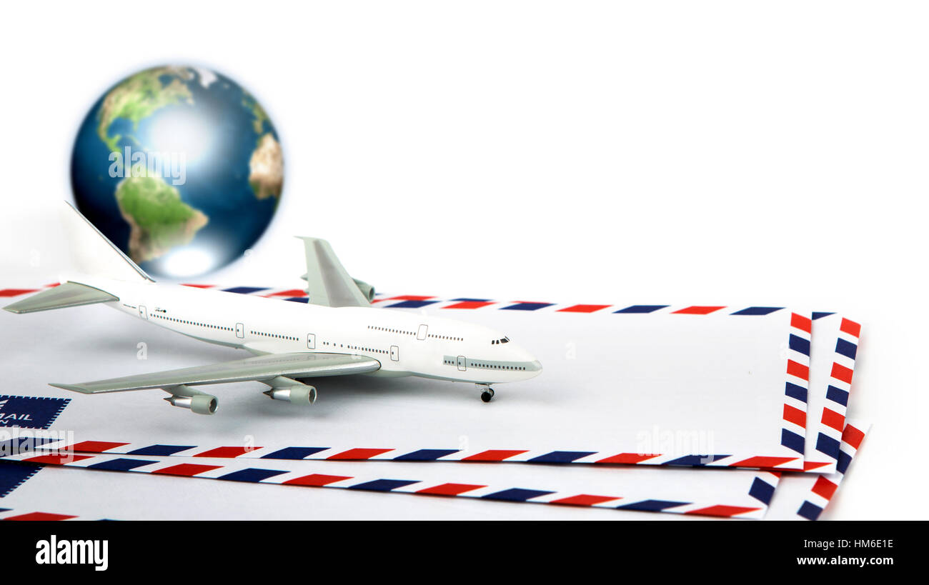 Airmail envelope with model airplane and earth (Elements of this image ...
