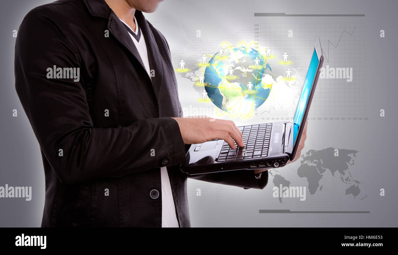 Business man with laptop Stock Photo - Alamy