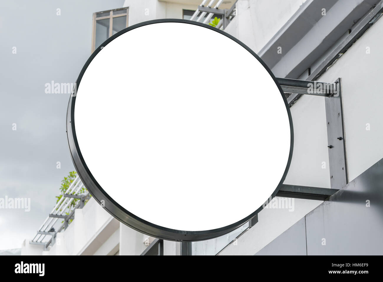 Round shop sign outdoor Stock Photo - Alamy