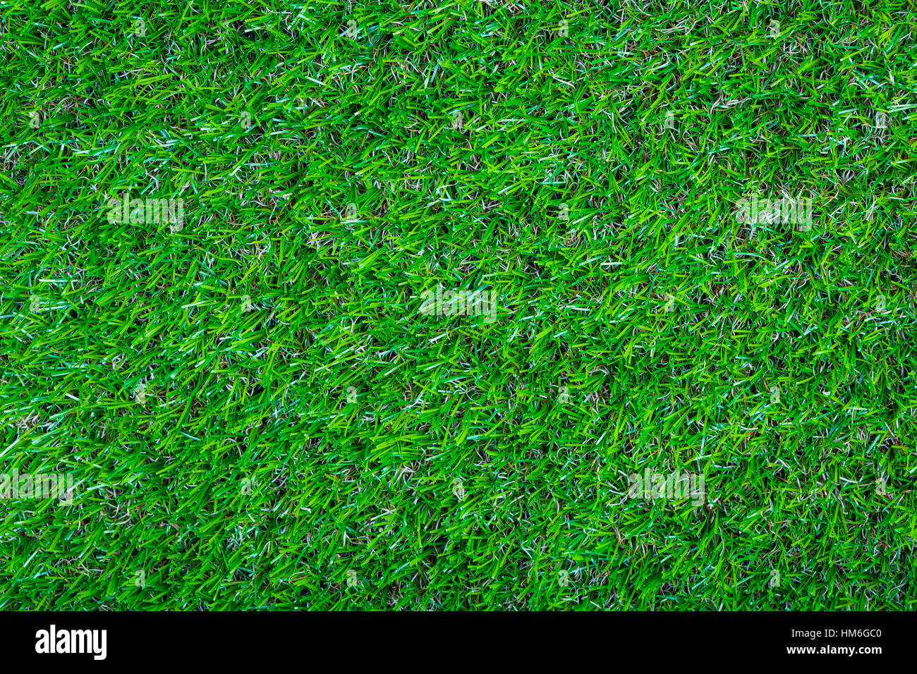 Artificial green grass background texture Stock Photo - Alamy