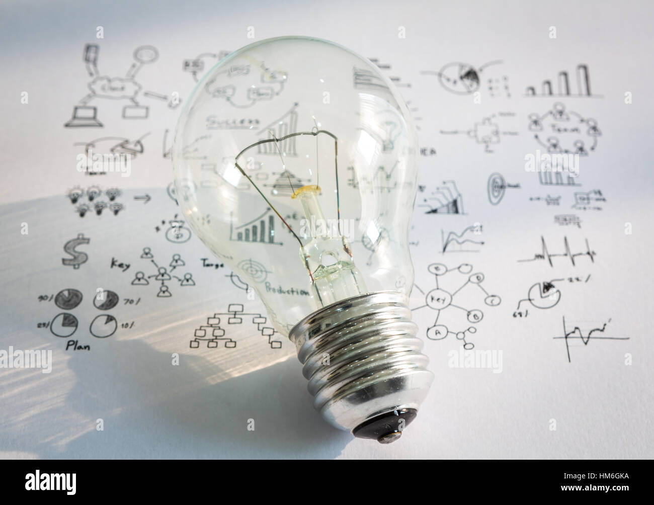 Light bulb with drawing graph Stock Photo - Alamy