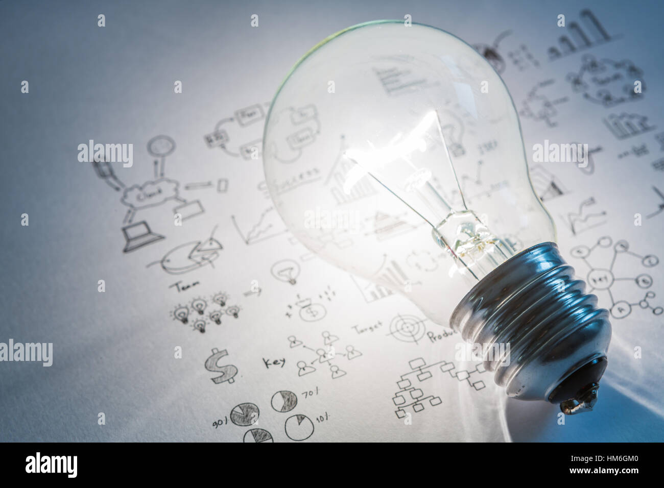 Light bulb with drawing graph Stock Photo - Alamy