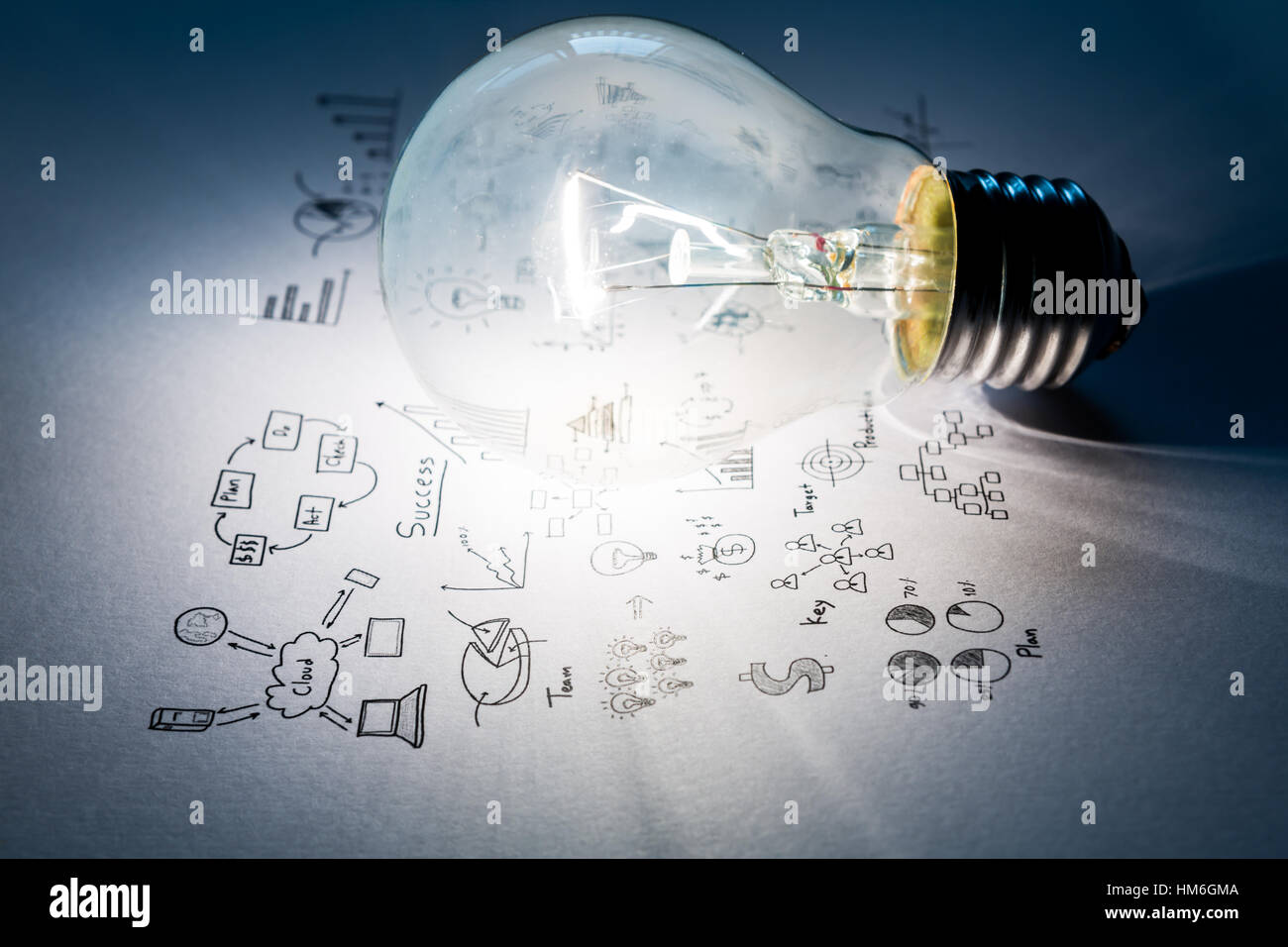 Light bulb with drawing graph Stock Photo - Alamy