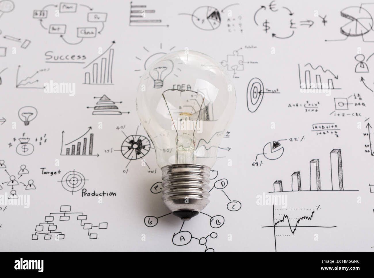 Light bulb with drawing graph Stock Photo - Alamy