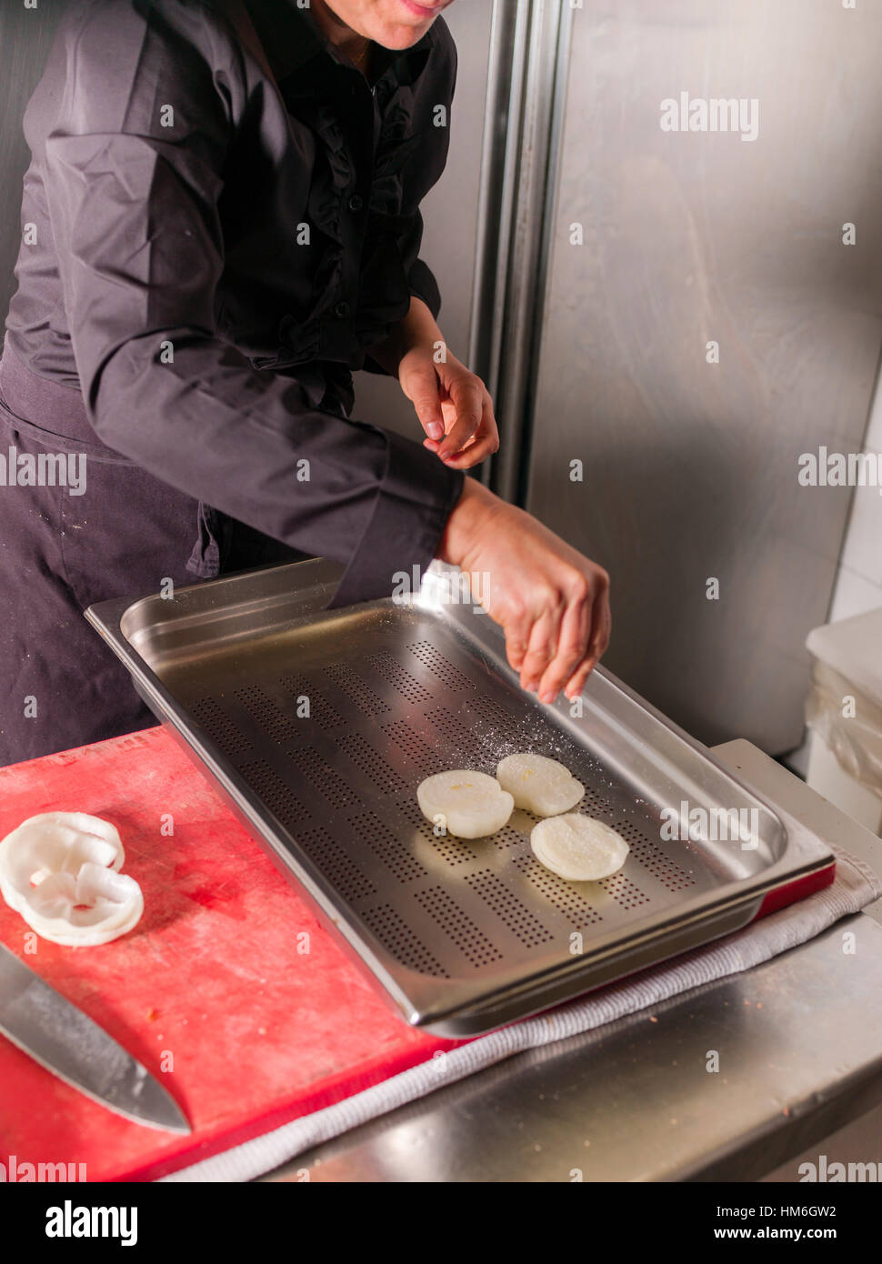 Chef Marina Morelli cooking in her restaurant Hosteria 700, Cremona ...