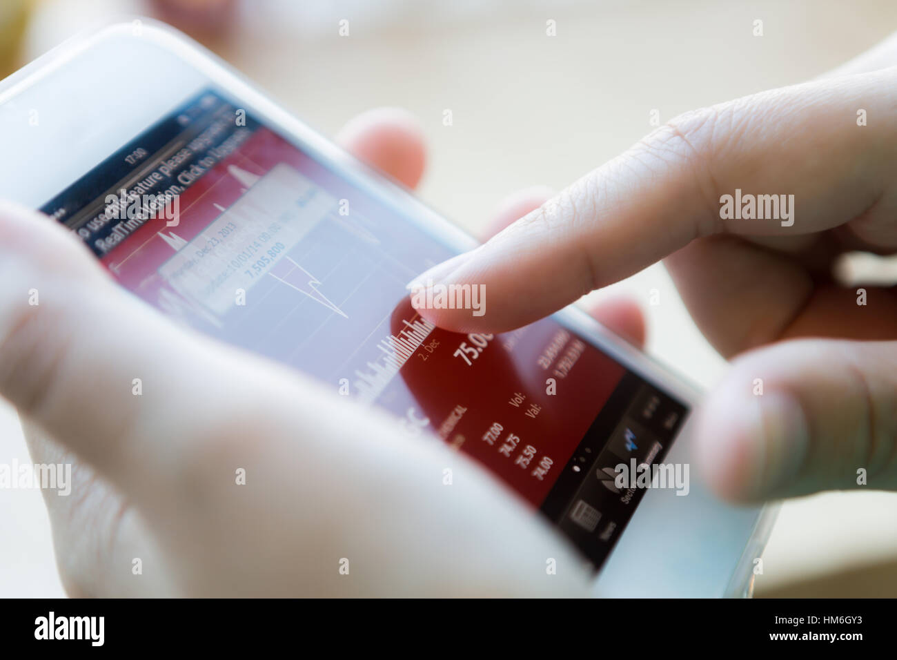 Hands holding and pointing on Smart Phone Stock Photo - Alamy