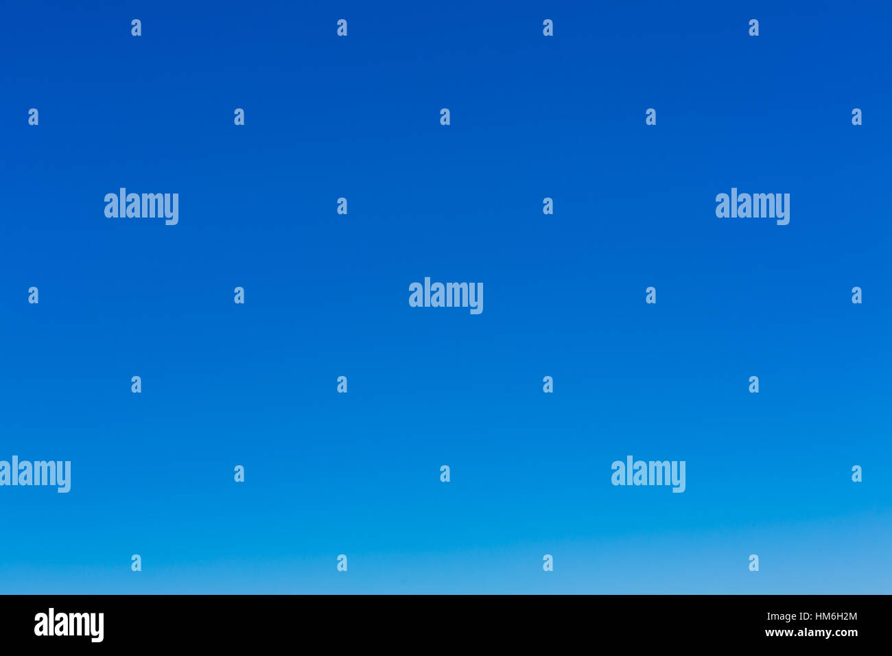 Clear blue sky background Stock Photo - Alamy