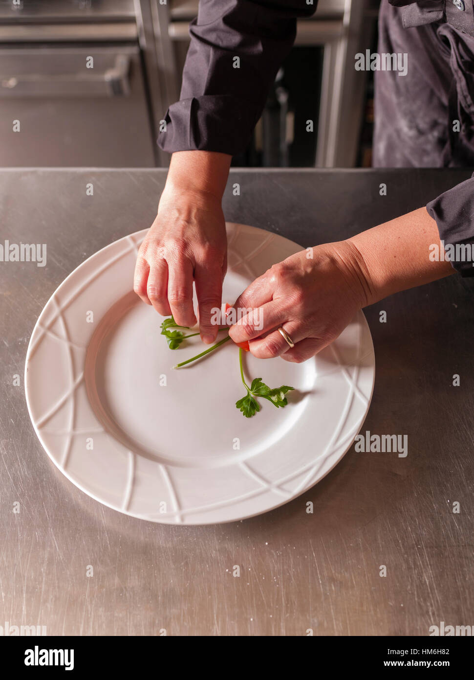 Chef Marina Morelli cooking in her restaurant Hosteria 700, Cremona ...