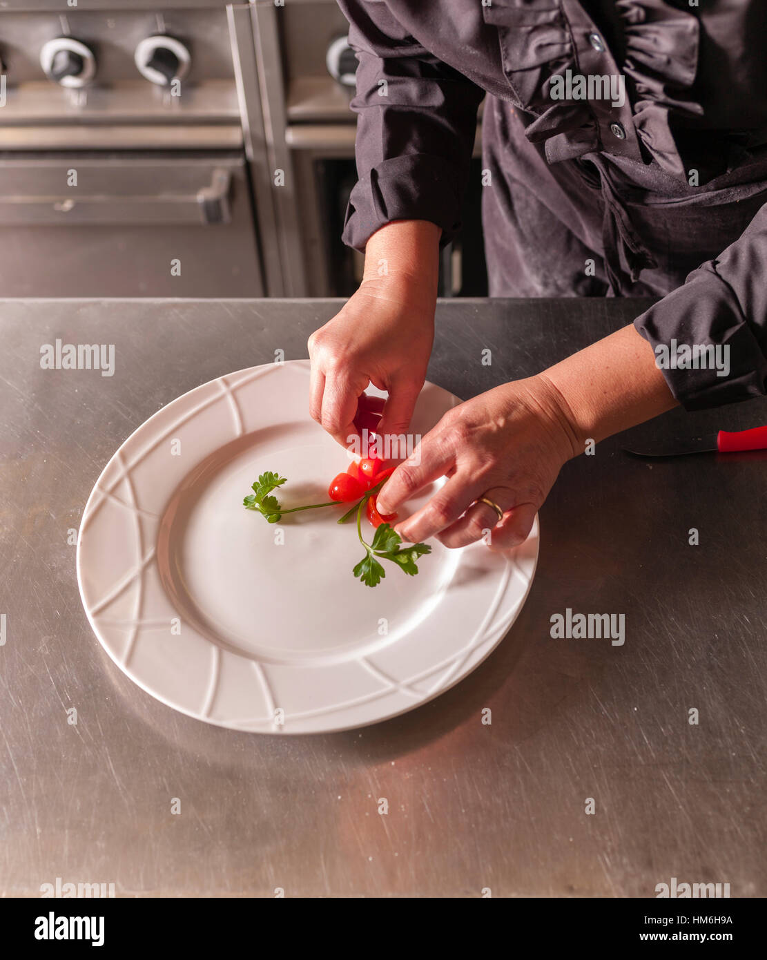 Chef Marina Morelli cooking in her restaurant Hosteria 700, Cremona ...