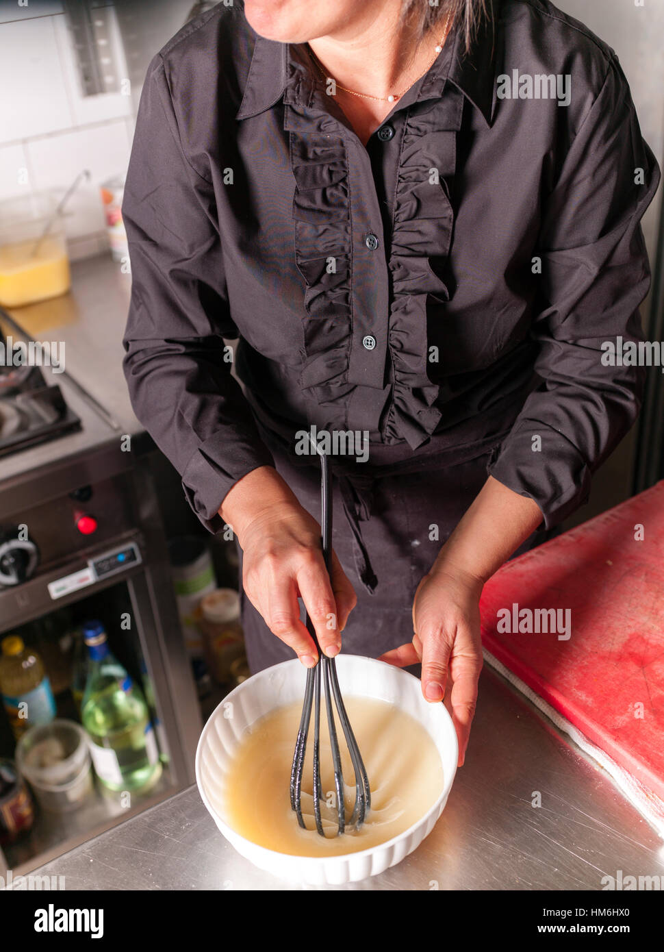 Chef Marina Morelli cooking in her restaurant Hosteria 700, Cremona ...