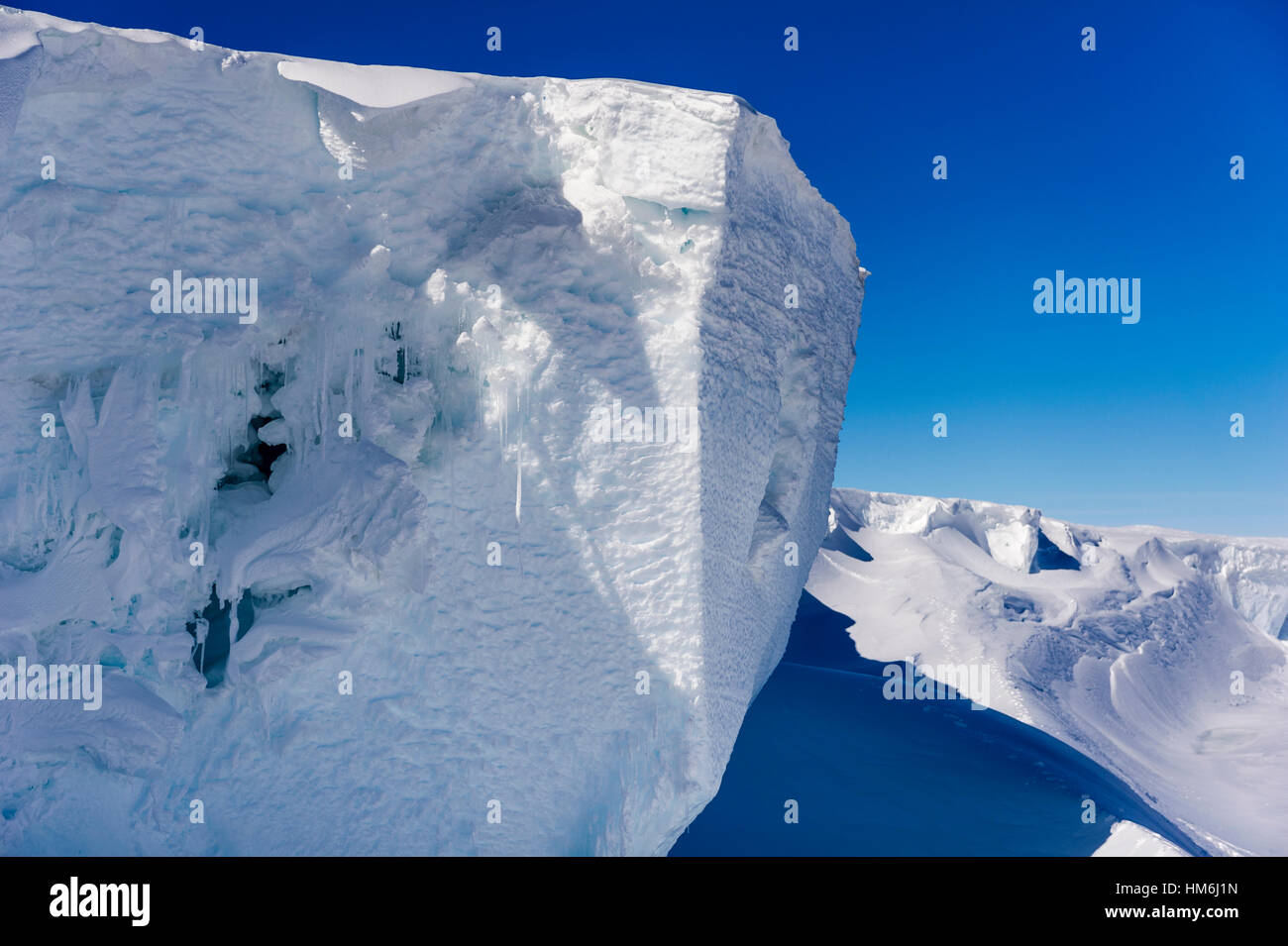 The sheer cliffs of the Erebus glacier tongue in Antarctica Stock Photo ...