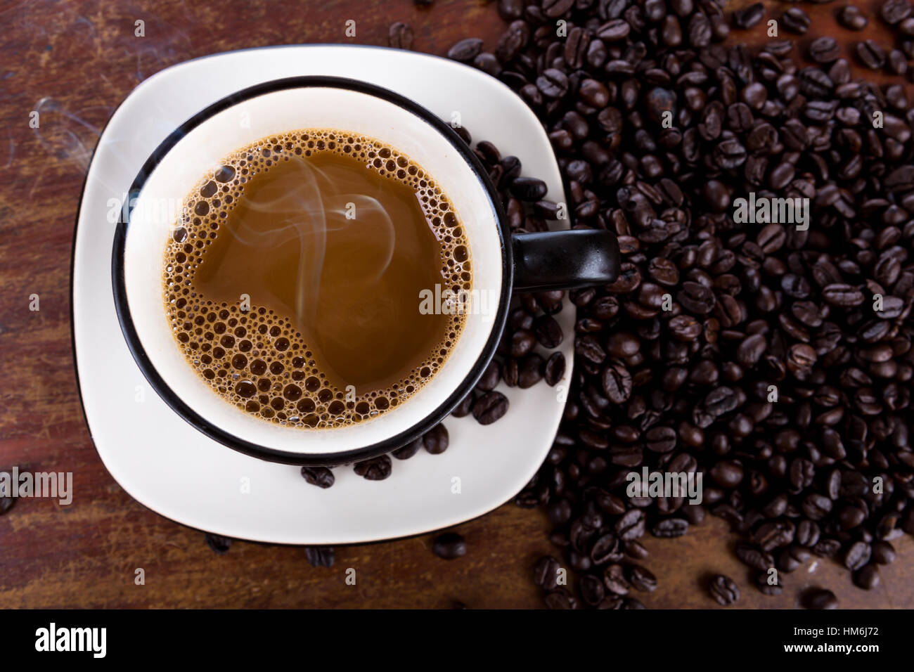 Coffee cup and beans Stock Photo - Alamy