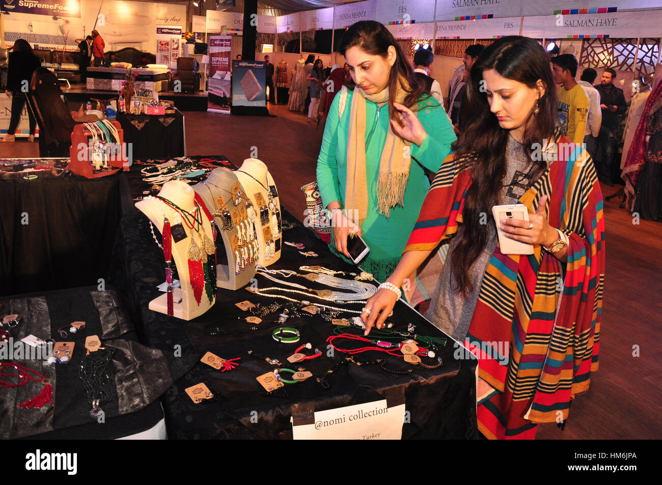 Pakistani people visit the stalls during Fashion and Life Style ...