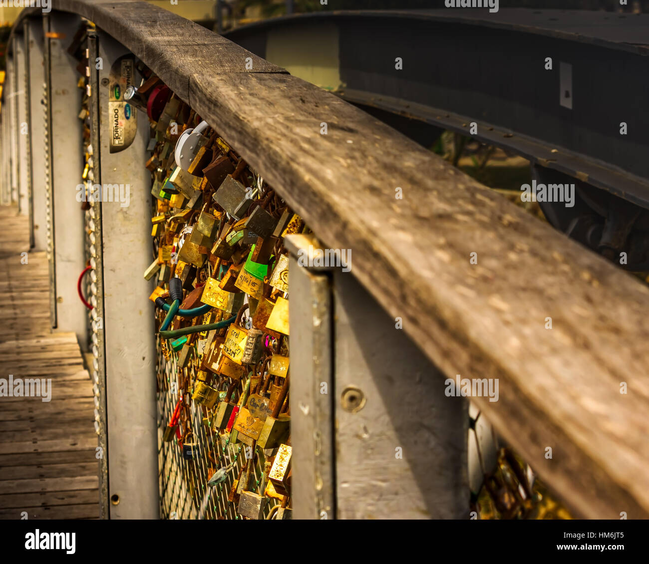 Locks on the bridge symbol of love Stock Photo - Alamy