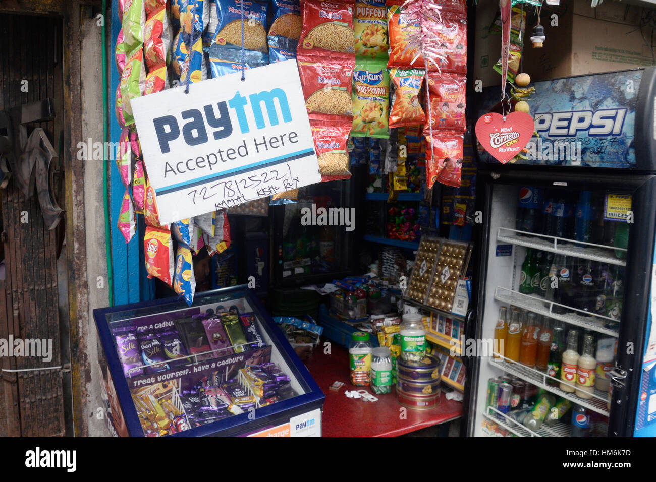 Kolkata, India. 31st Jan, 2017. Shop display Paytm sign in front of ...
