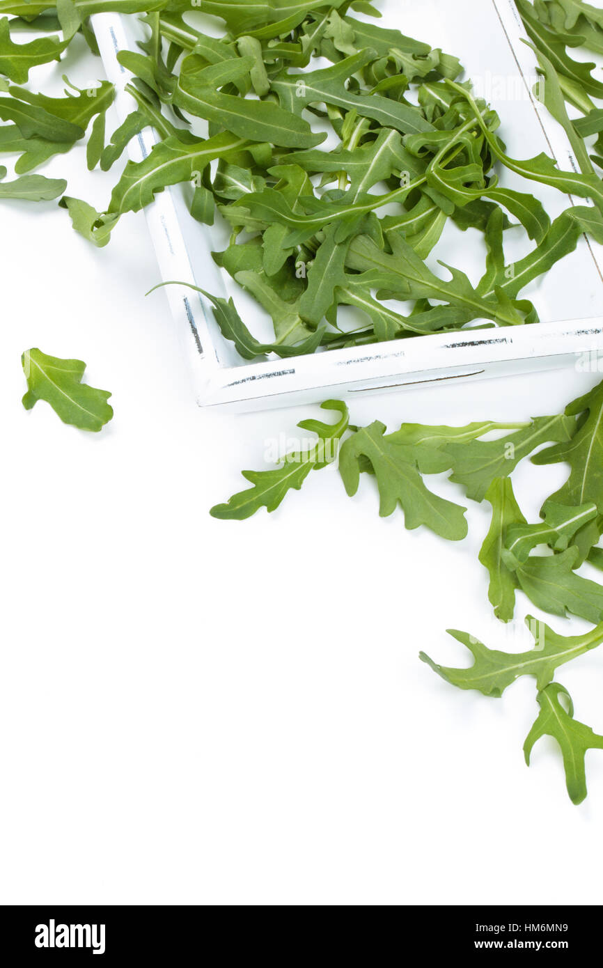 Fresh arugula leaves. Isolated on white background Stock Photo - Alamy
