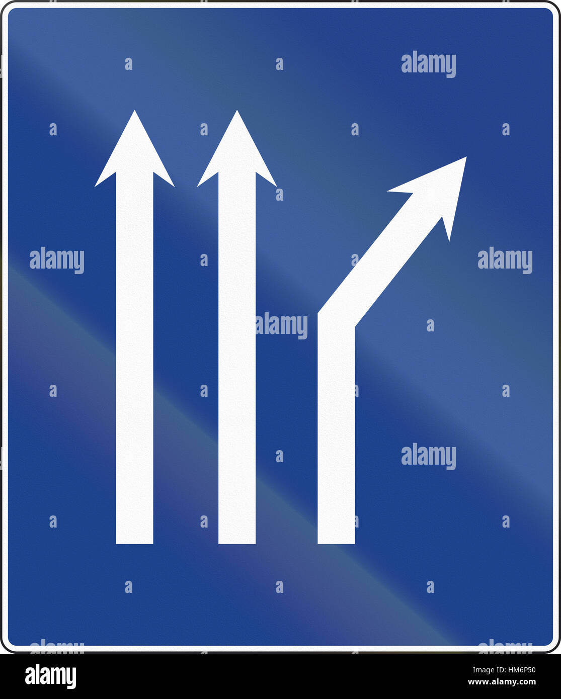 Road sign used in Spain - Fork right on three-lane carriageway Stock ...