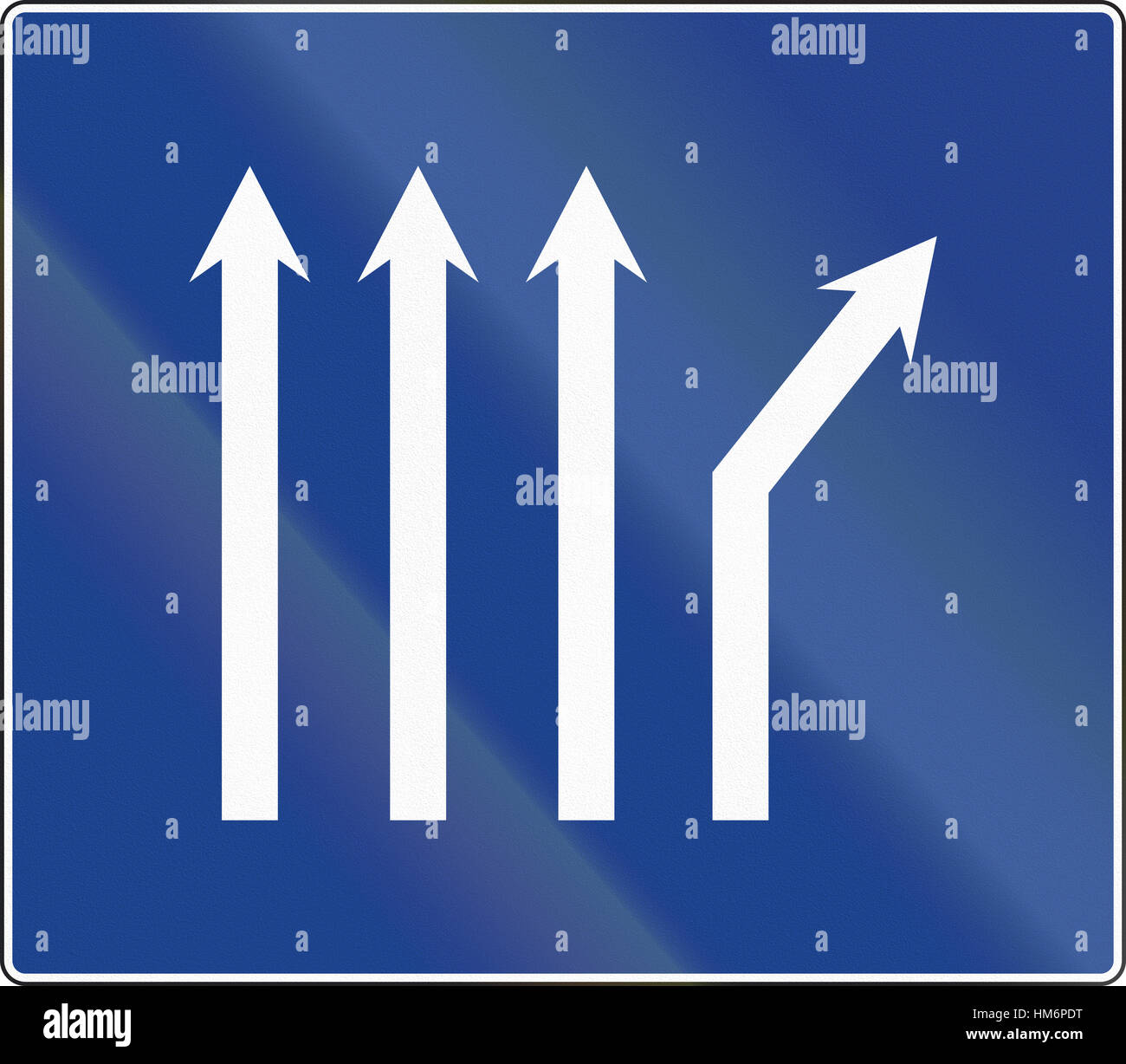 Road sign used in Spain - Fork right on four-lane road Stock Photo - Alamy