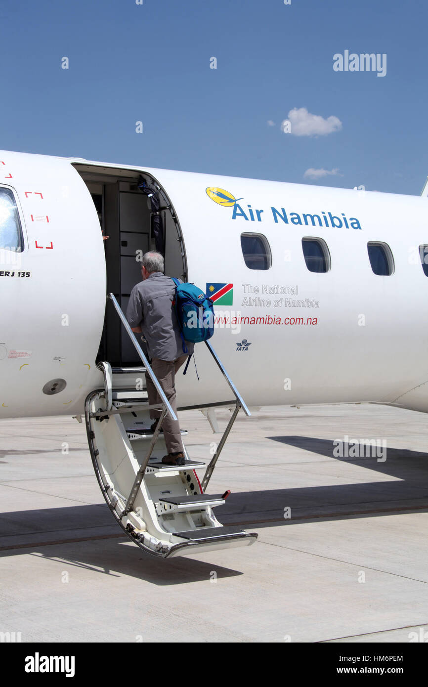 Passenger boarding an Air Namibia plane Stock Photo - Alamy
