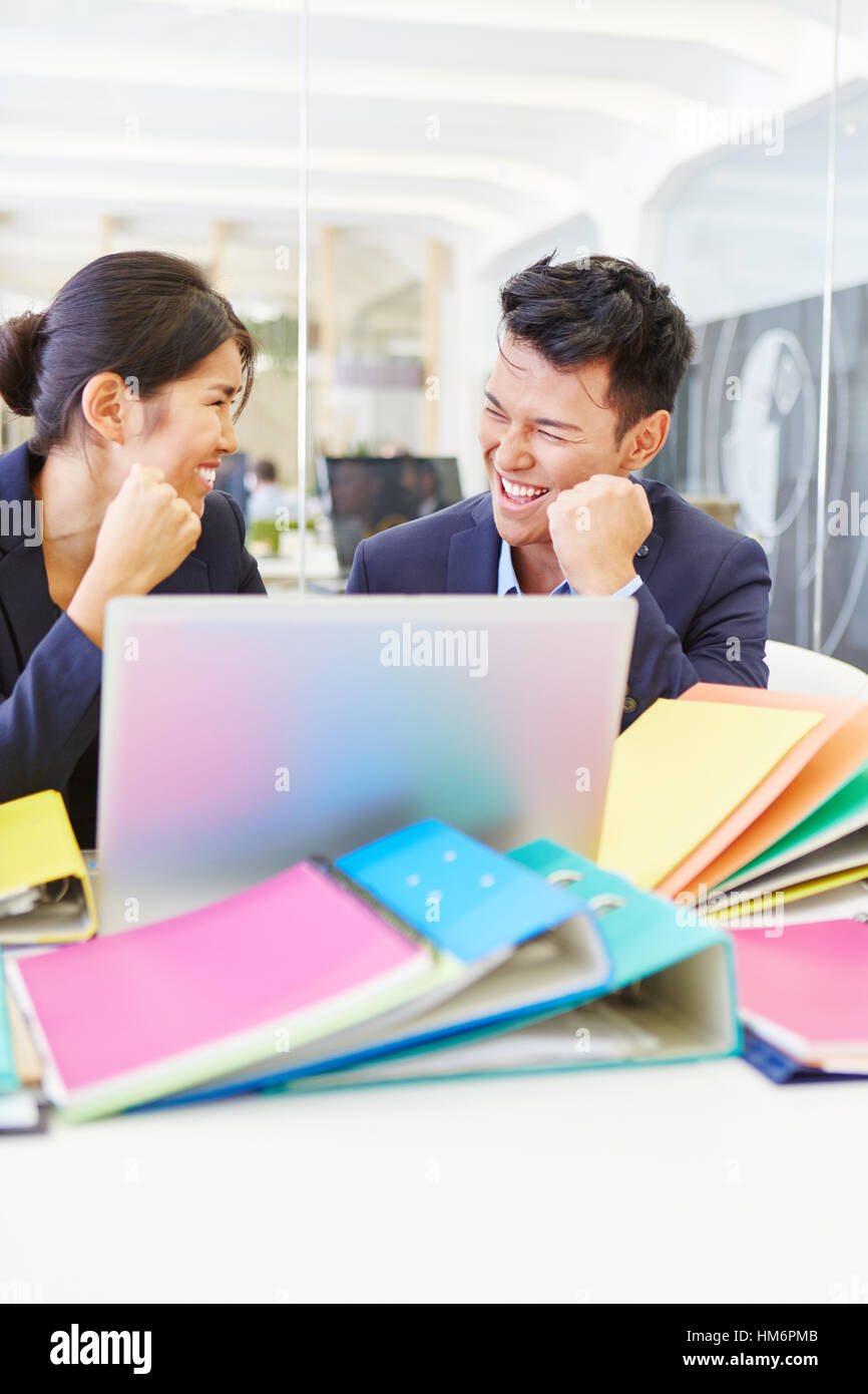 Successful founders celebrate in start-up company Stock Photo - Alamy