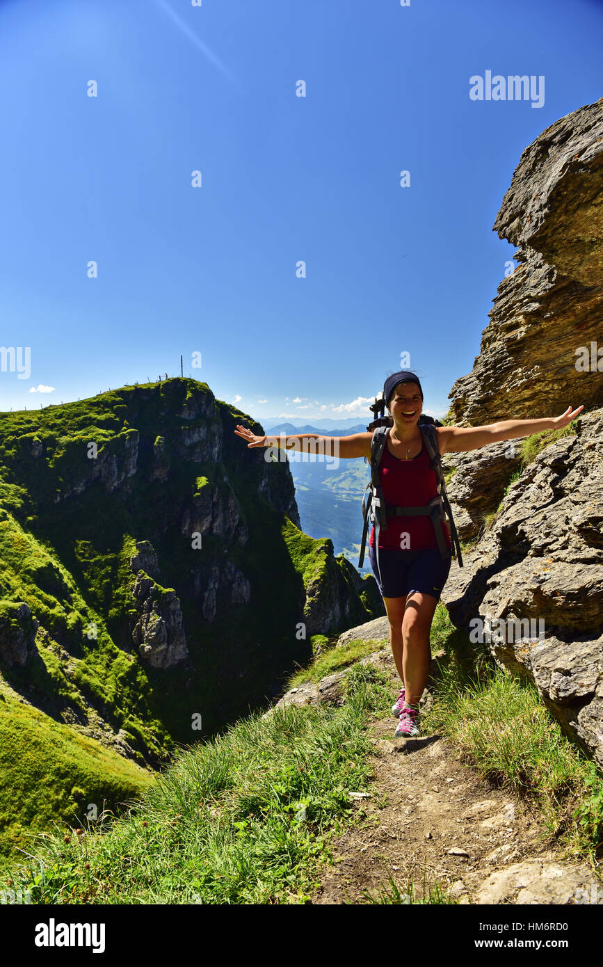 young woman stands on the abyss Stock Photo - Alamy