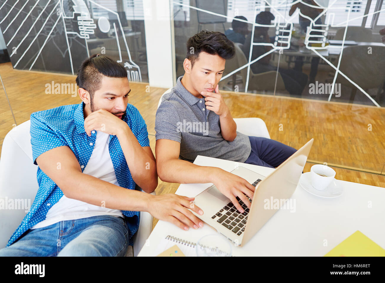 Young programmers working computer hi-res stock photography and images ...