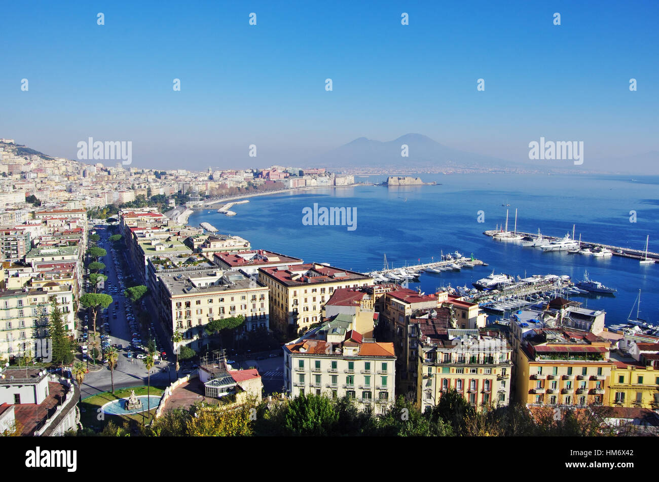 Aerial view of Naples and its gulf, with the Vesuvius in the background ...