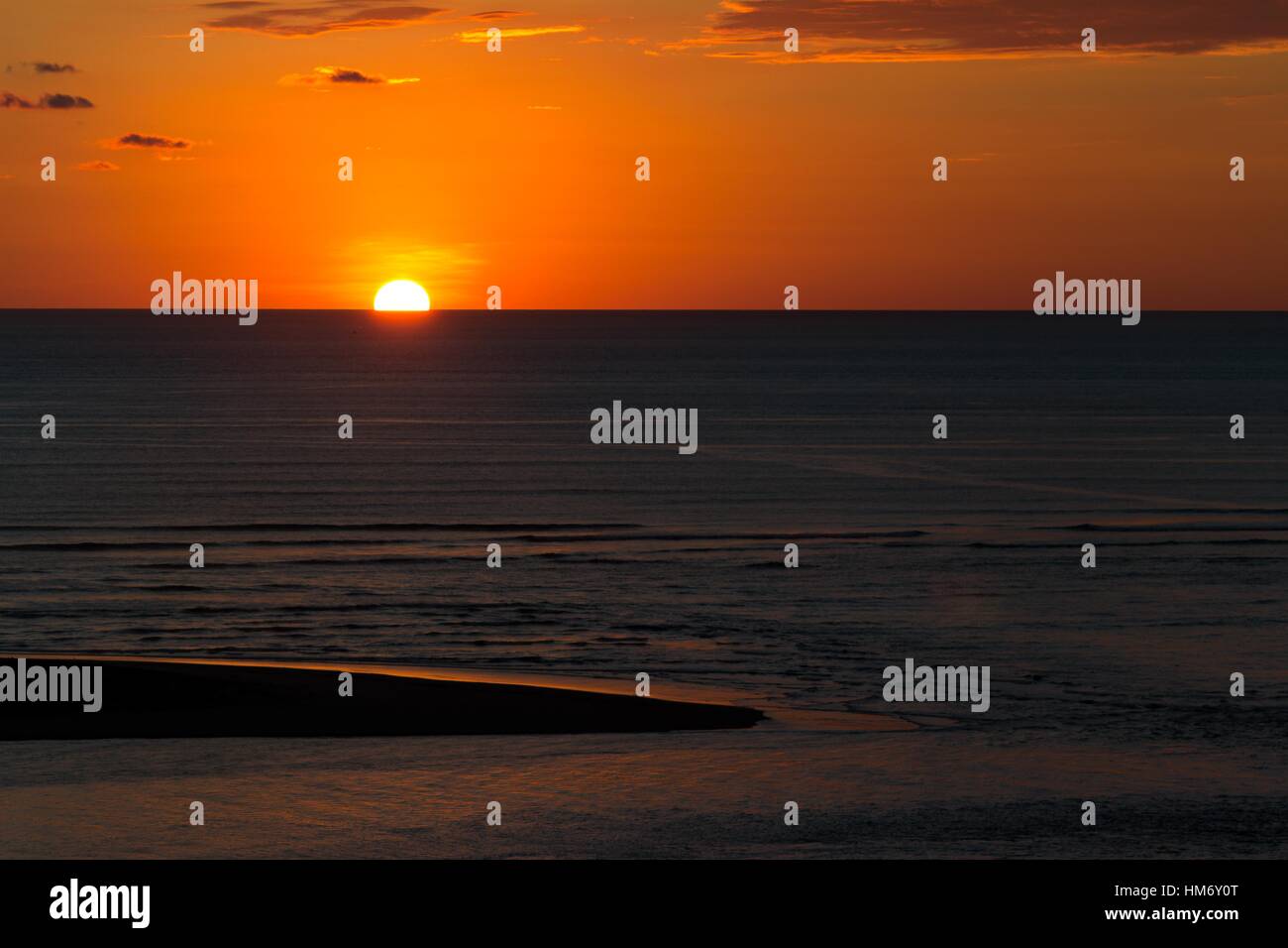 The Costa Rican sun sets over the Pacific Ocean in a brilliant display ...