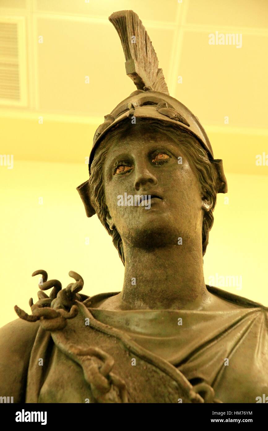 The Peiraeus Athena. The goddess wears a Doric peplos, with a large ...