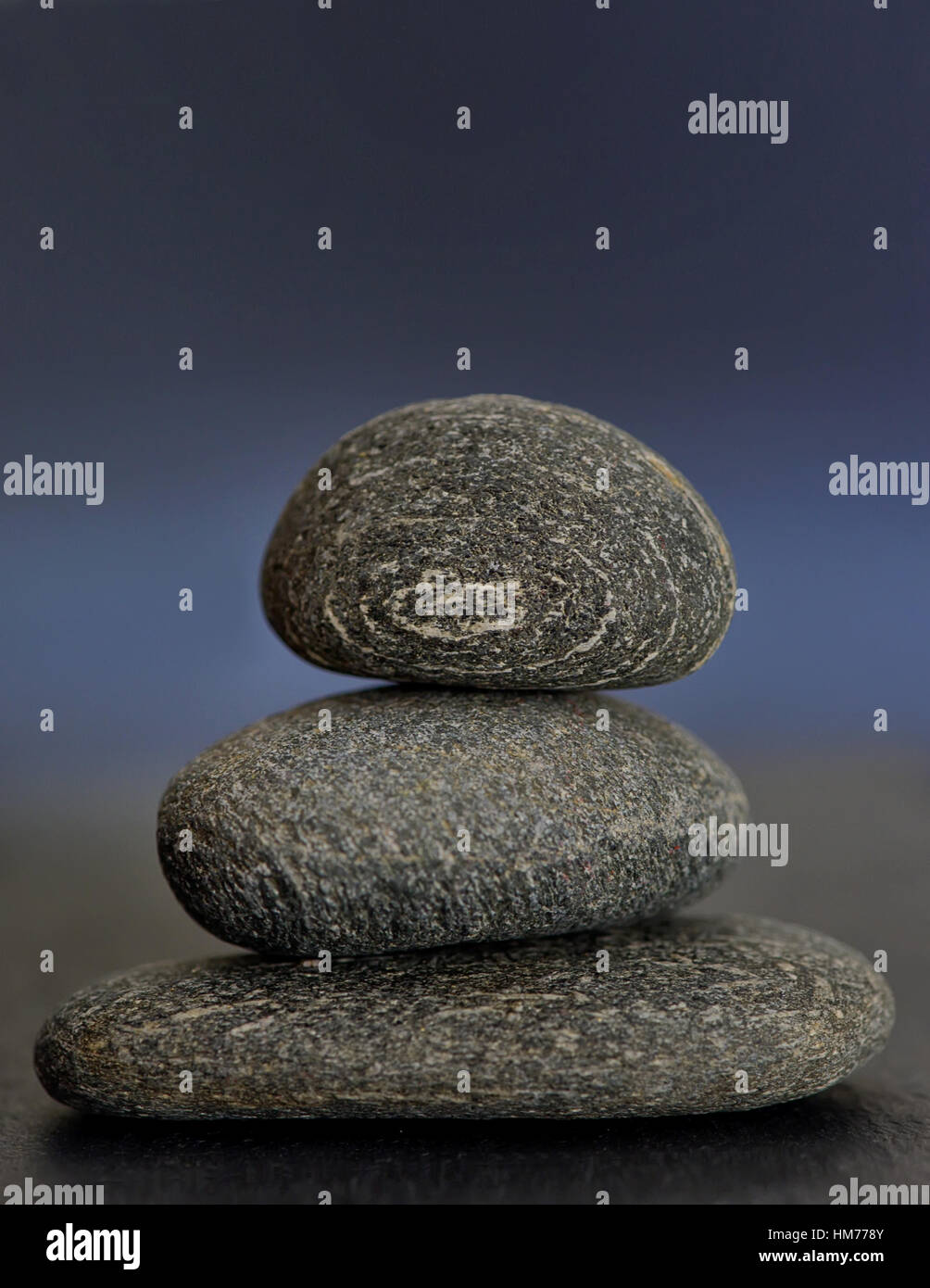 pile of pebble stones isolated in nature Stock Photo - Alamy