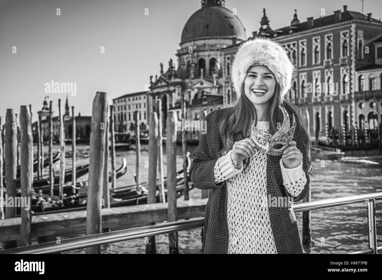 Another world vacation. Portrait of smiling modern fashion-monger in ...