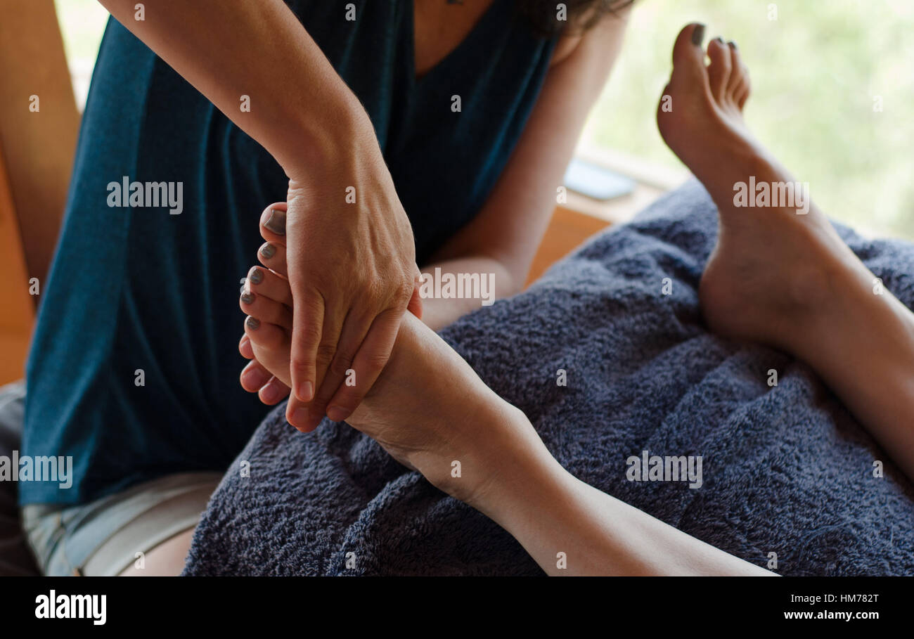 Reflexology Foot Therapist Stock Photo - Alamy