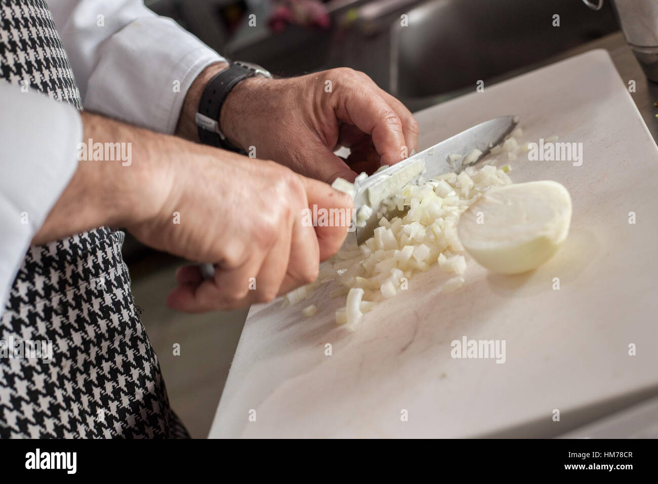 Person cutting wooden board hi-res stock photography and images - Alamy