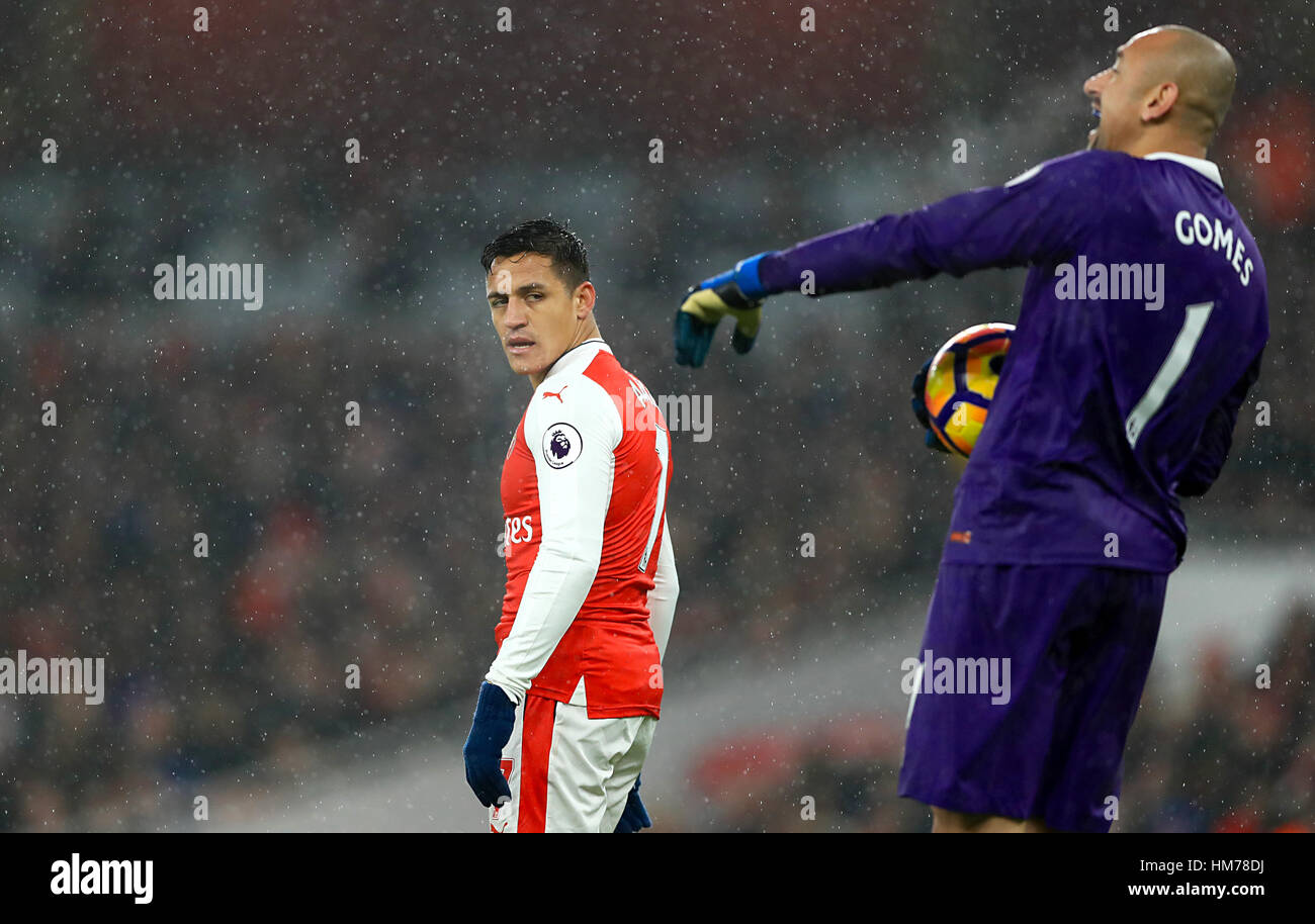 Arsenal's Alexis Sanchez looks back at Watford goalkeeper Heurelho ...