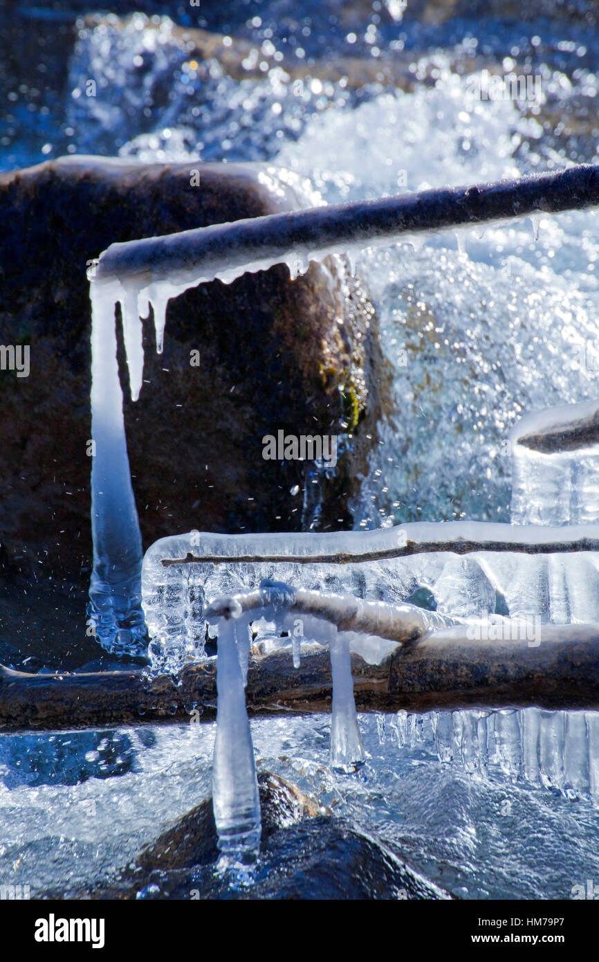 Natural ice forms in a mountain river Stock Photo - Alamy