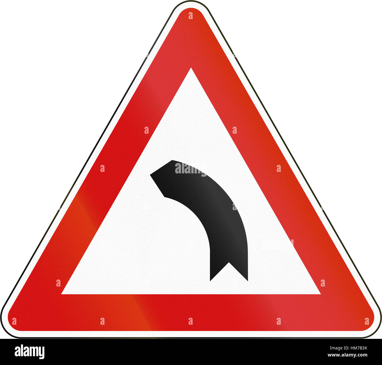 Slovenia road sign - Bend to left Stock Photo - Alamy
