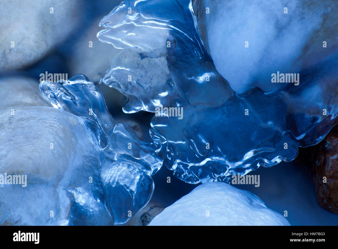 Natural plastic ice forms by a mountain brook Stock Photo - Alamy