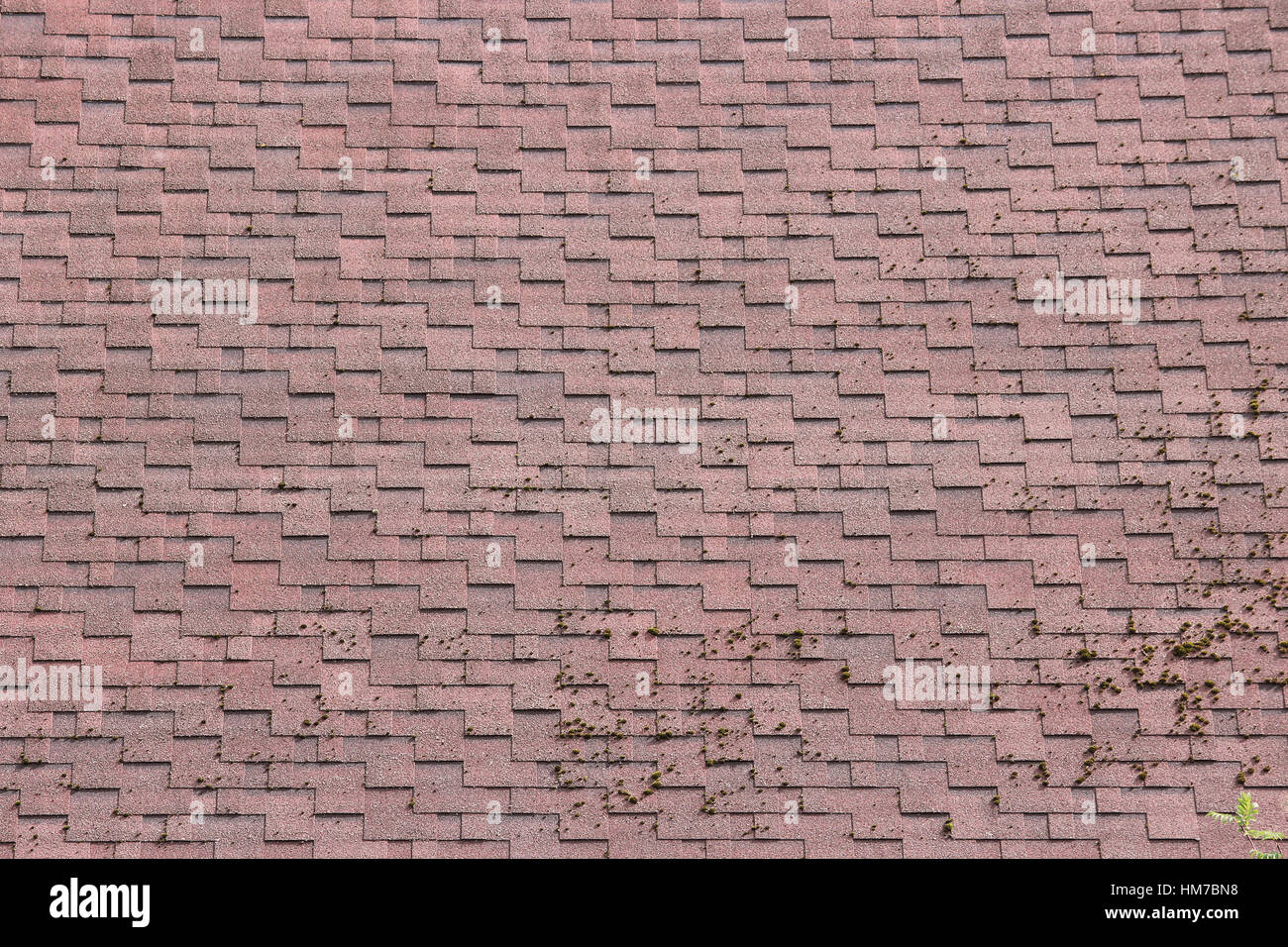Flexible shingles of red-brown color on the house roof Stock Photo - Alamy