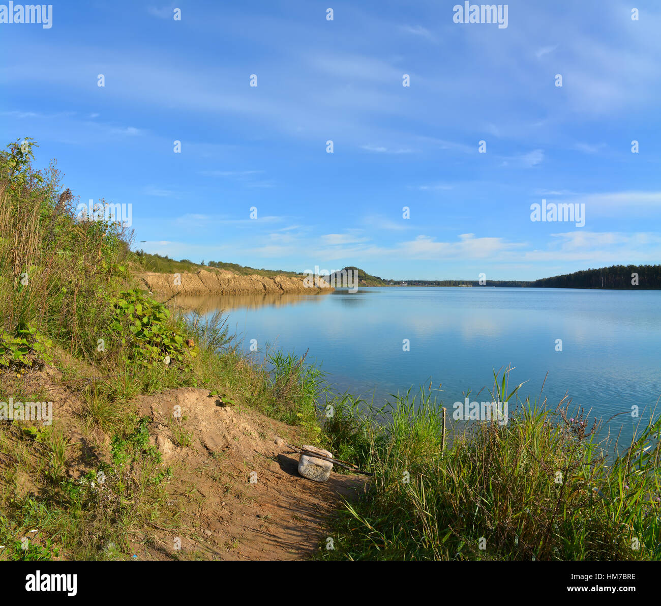 Abandoned sand quarry with blue water Stock Photo - Alamy