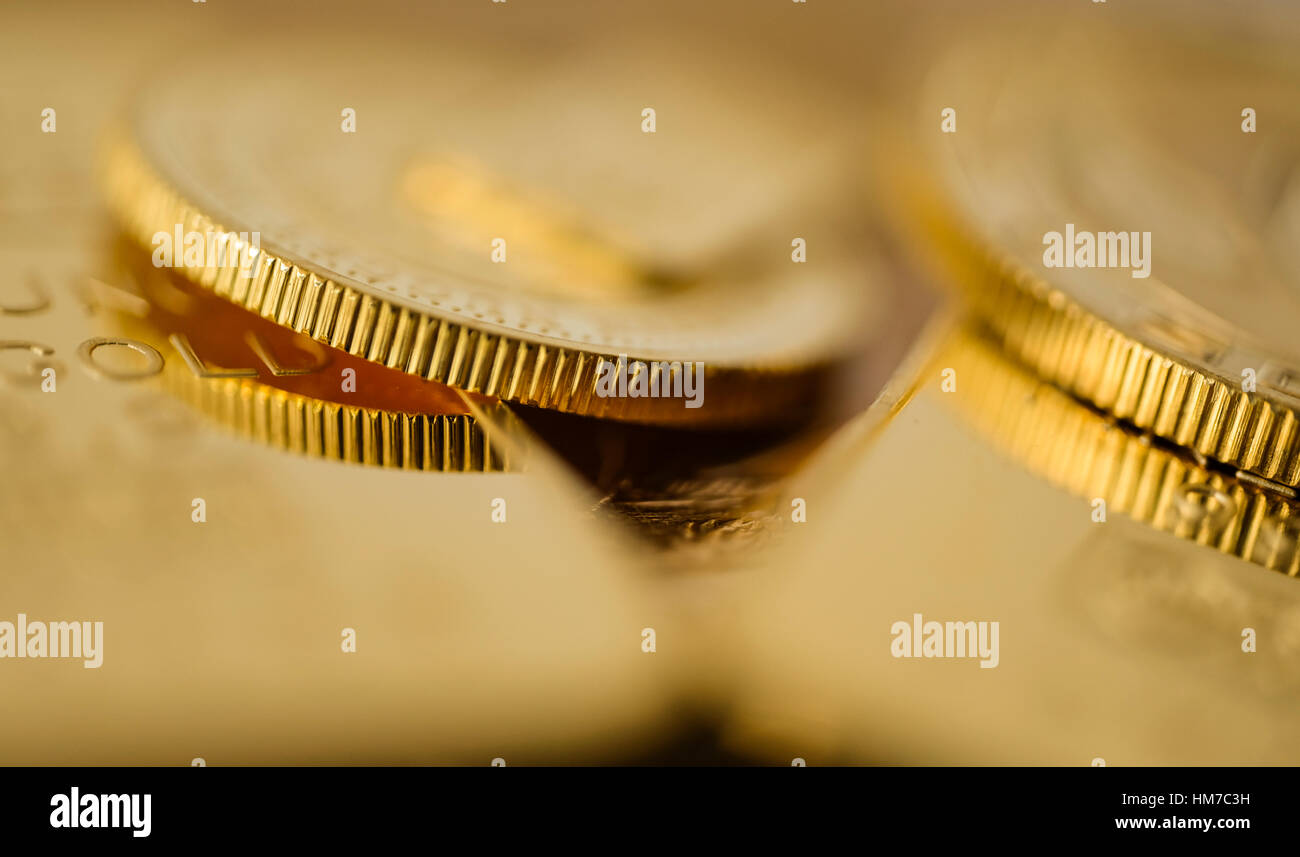 Close-up of gold coins Stock Photo - Alamy