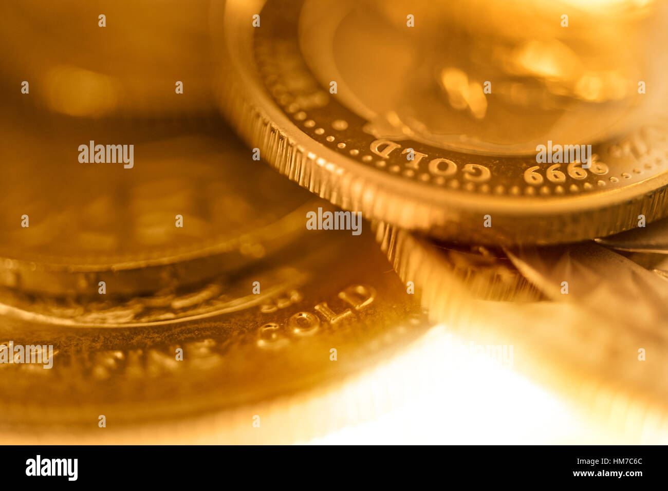 Close-up of gold coins Stock Photo - Alamy