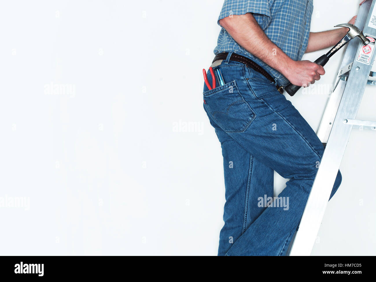 Man climbing on ladder Stock Photo - Alamy